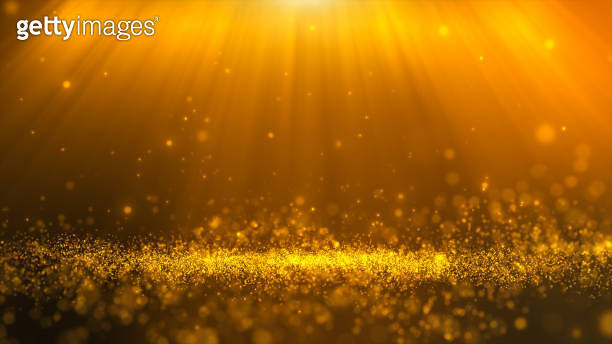 Glitter yellow gold particles stage and light shine abstract background. Flickering particles ...