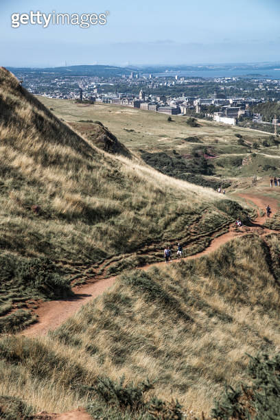 Scotland, Edinburgh. Holyrood park and ancient volcano. City of ...