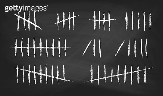 Tally marks set on school black chalkboard. Collection of white hash ...