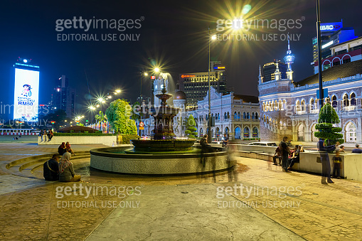 Night view of Independence square and Queen Victoria water fountain in ...