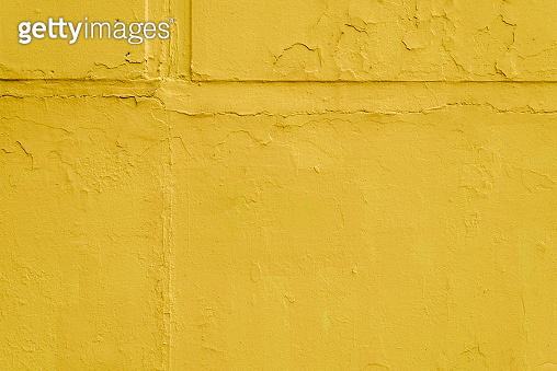 Saturated yellow rough texture background, bright paint on concrete ...