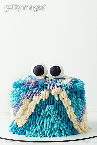 Cute monster cake on the white background. Funny birthday cake with ...