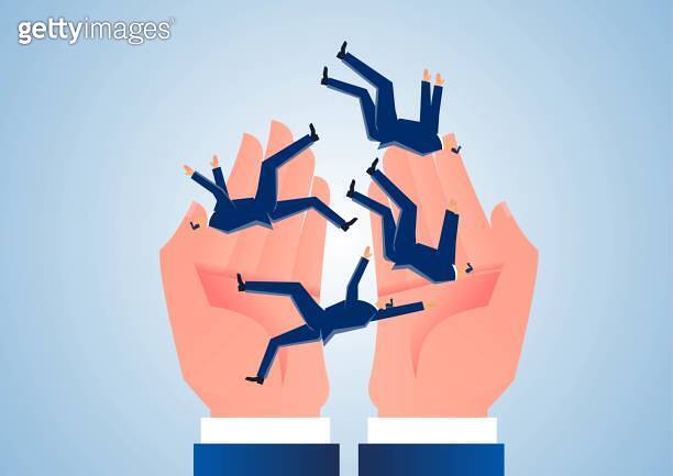 Falling businessman falls into huge hands avoiding the danger of ...