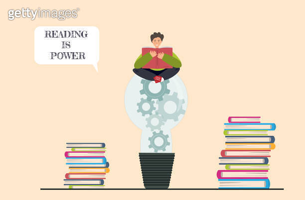 Young happy man, student reading books at the library, reading is power ...