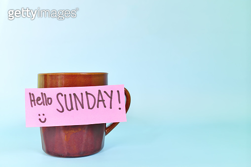 Welcome, hello and happy Sunday concept. Selective focus of coffee cup ...