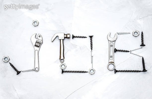 Lettering JOB made from hand tools and fasteners on gray 이미지 ...