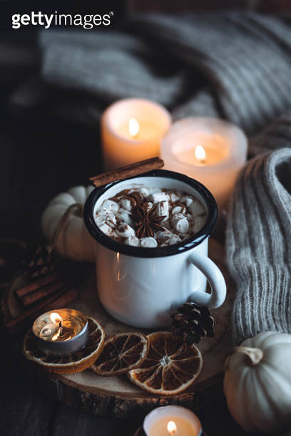 Autumn cozy home composition with hot chocolate with marshmallow and ...