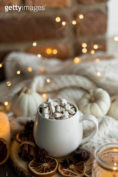 Autumn cozy home composition with hot chocolate with marshmallow and ...
