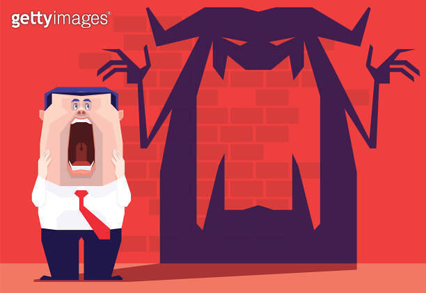 screaming businessman with angry devil shadow 이미지 (1430970784) - 게티이미지뱅크