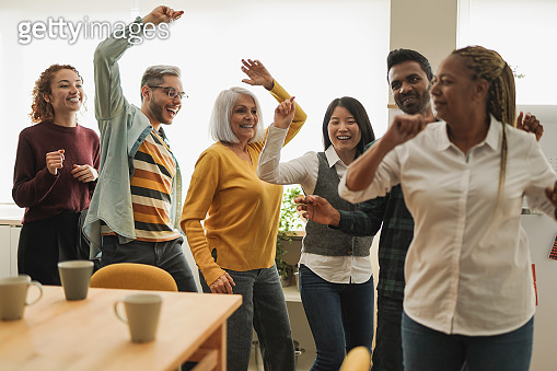 Happy multi generational people having fun dancing to music playlist at ...