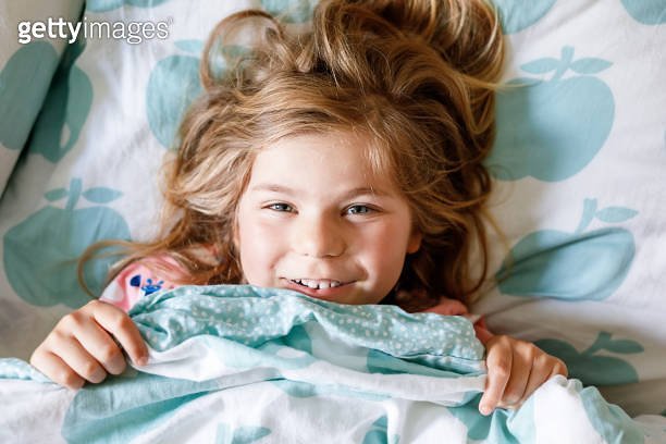 Cute little toddler girl sleeping in bed. Adorable preschool child ...