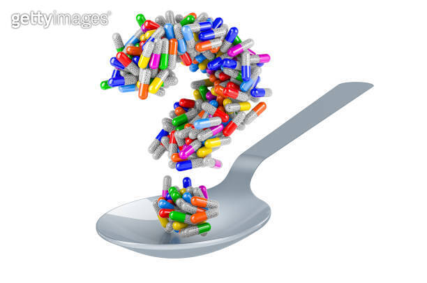 Question mark from medical drugs on a spoon. 3D rendering (1370557848 ...