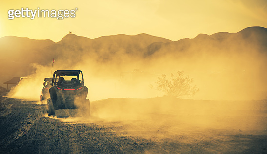 Side by Side ROV Recreational Off Highway Vehicles on a Desert Road ...