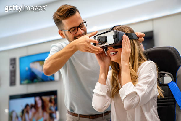 Group of people using virtual reality headset at exhibition, show. VR ...