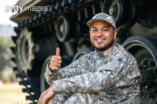 Asian man special forces soldier against on the field Mission ...