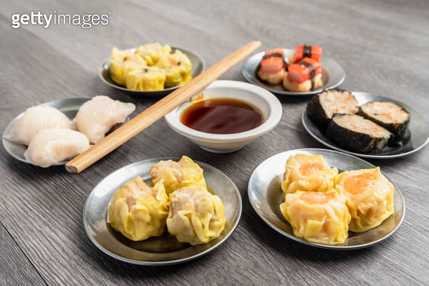 Chinese breakfast dim sum with sauce placed in the middle. 이미지 ...