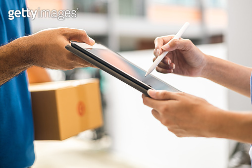 Hand woman signing electronic Signature on tablet for agreement of ...
