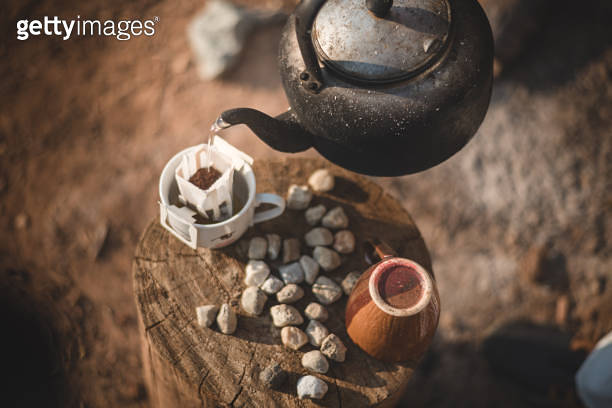 The process of making a drip coffee using the boiled water from an old ...