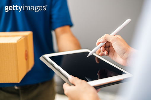 Hand woman signing electronic Signature on tablet for agreement of ...