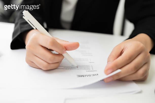 Close up hand business woman manager checking documents reports papers ...