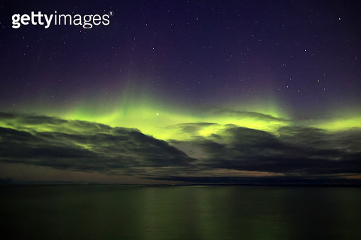 Aurora Borealis or northern lights on the west coast of Greenland ...