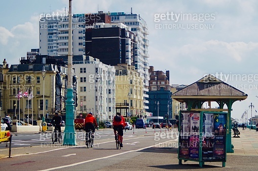 Brighton seafront by Hove Lawns and Meeting Place Cafe on a sunny ...