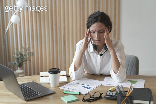 Frustrated upset italian woman holding head in hands suffering from ...