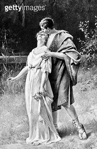 The first kiss: young couple standing on a meadow 이미지 (1427541419) - 게티 ...