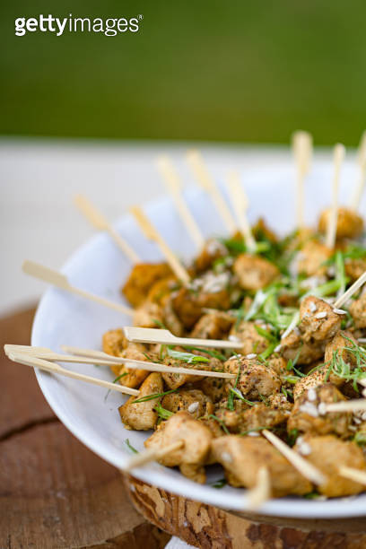 Spicy grilled Chicken Canape Appetizer Skewers Kebabs with wooden pegs ...