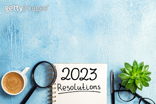 New year resolutions 2023 on desk. 2023 resolutions list with notebook ...