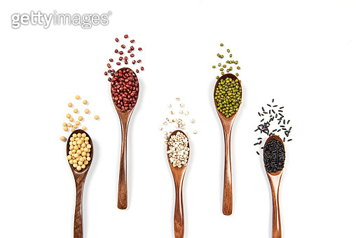 veriety natural organic cereal and grain seed in spoon on white ...