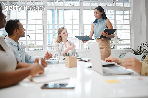 Female intern, assistant or employee handing out an information ...