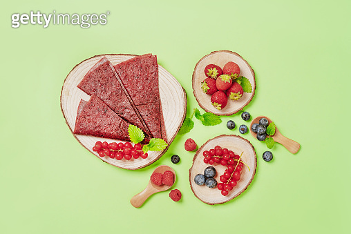 Natural sweets from berries and fruits.Close-up mix sliced.Vegetarian ...