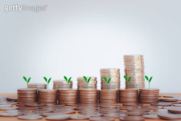 Stacking money coins for growing growth financial and business. Savings ...