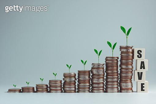 Stacking of money for growing growth financial and business. Savings ...