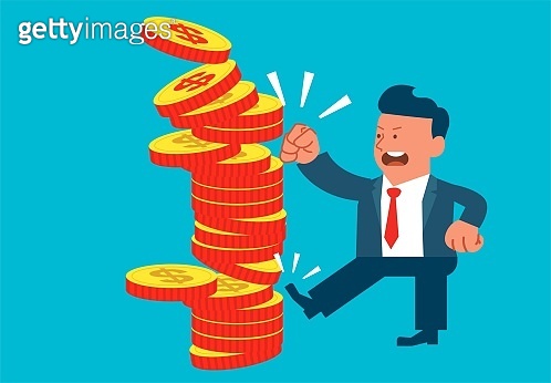 Angry businessman punching and kicking gold coins stack and knocking ...