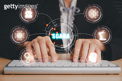 SCADA Supervisory control and data acquisition technology concept, Woman hand typing on keyboard ...