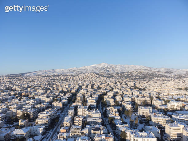 Aerial panoramic photo of north Athens in snow at dusk - Halandri ...