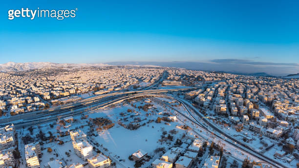 Aerial panoramic photo of north Athens in snow at dusk - Halandri ...
