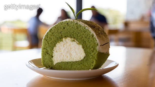 Green tea roll cake with tea leaves. Delicious Matcha green tea Swiss ...