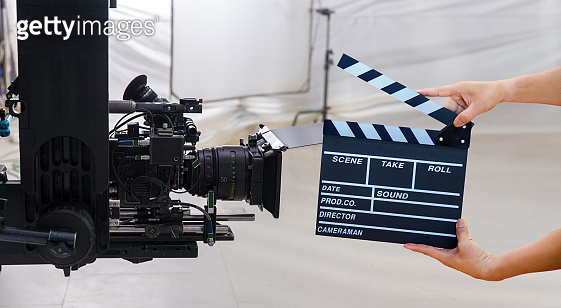 Man hands holding movie clapper. Film director concept. Behind the ...