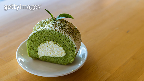 Green tea roll cake with tea leaves. Delicious Matcha green tea Swiss ...