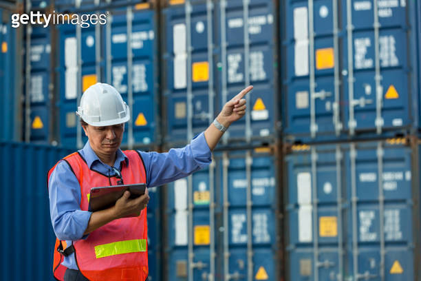 Foreman man working checking at Container cargo harbor to loading ...