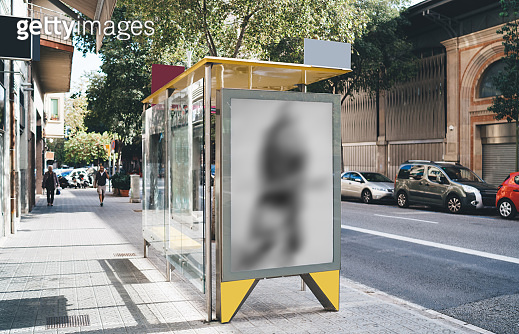 Picture of modern glass transparent bus stop with banner on side for ...