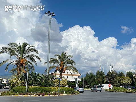 Crossroad, road, roundabout and palm trees in Turkey on vacation in a ...