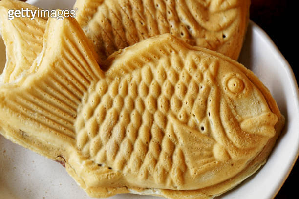 Taiyaki is a fish-shaped waffle filled with red bean paste inside ...