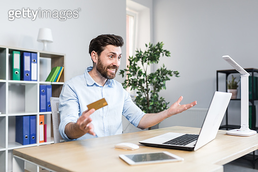 Frustrated and angry man in the office trying to make a purchase in an ...