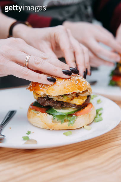 Burgers with beef and vegetables. Close up. Delicious burgers in a ...