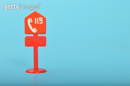 Red 911 sign isolated on a blue background. Emergency number 911. 이미지 ...