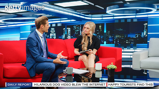 Talk Show TV Program: Two Charismatic Presenters Talk. Cable Channel ...